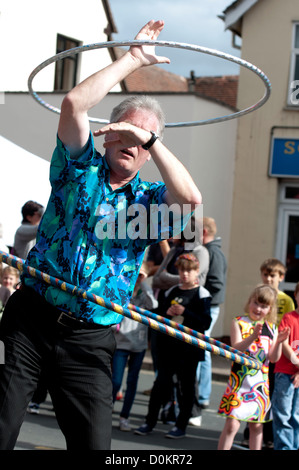 Man doing hula hoop show Stock Photo - Alamy
