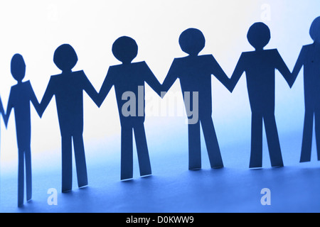 paper team linked together partnership concept Stock Photo - Alamy