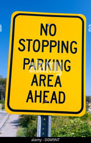 No stopping sign and yellow road markings outside a village primary ...