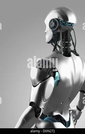 A male android standing against a gray backdrop Stock Photo - Alamy