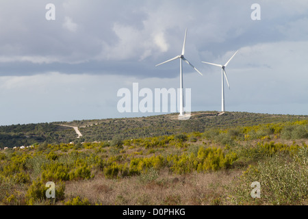 sunlit eolic blades on a hill Stock Photo - Alamy