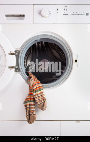 Close up of clothes washing machine button Stock Photo - Alamy