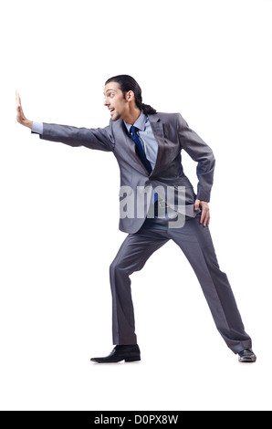 Business man pushing invisible obstacle Stock Photo - Alamy