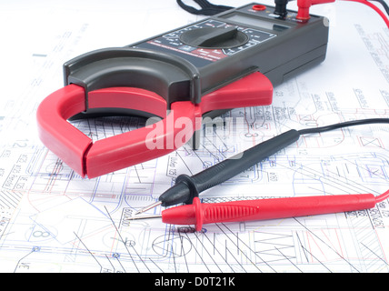 Cable of multimeter on diagram of electronics printed circuit board ...