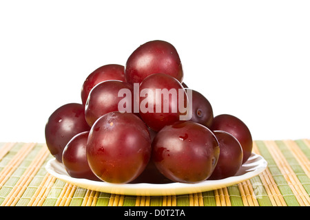 Ripe juicy plums as background Stock Photo - Alamy