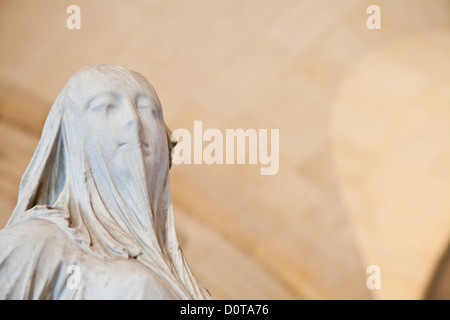 Jesus Christ marble funerary statue among leaves Stock Photo - Alamy