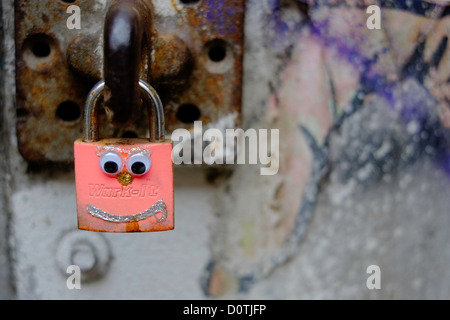 Padlock with a face creatively painted onto Stock Photo - Alamy