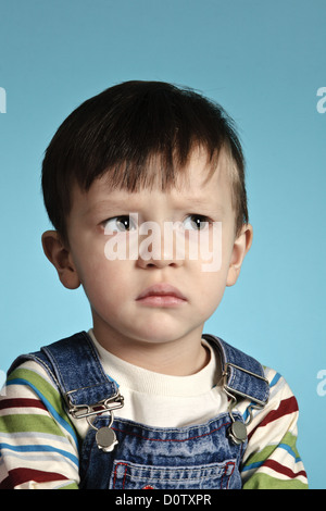 One sad little boy tearful child feeling displeased Stock Photo - Alamy
