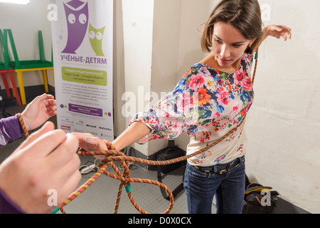 game rope fun activity office workers Stock Photo - Alamy