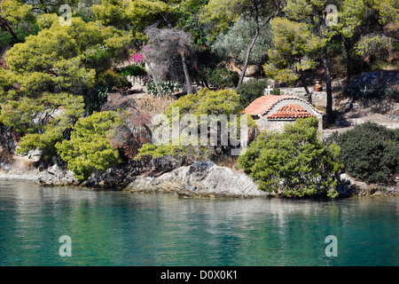 The beach of Love Bay, in Poros island, in Argosaronic Gulf, very close ...
