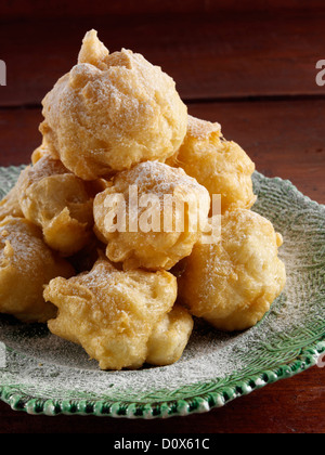 Beignets - deep fried pastry with icing sugar, iced coffee Stock Photo ...