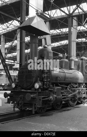 Old industrial locomotive in the garage abandoned Stock Photo - Alamy