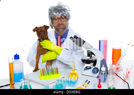 Crazy nerd scientist silly veterinary man with dog in chemical ...
