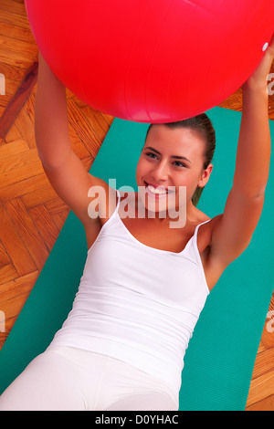 physiotherapy exercises with bobath ball fitball Stock Photo - Alamy