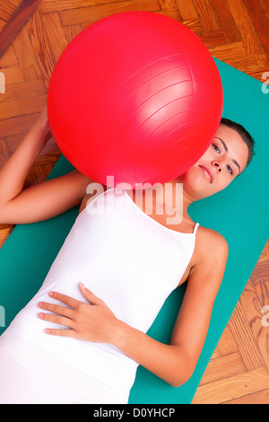 physiotherapy exercises with bobath ball fitball Stock Photo - Alamy