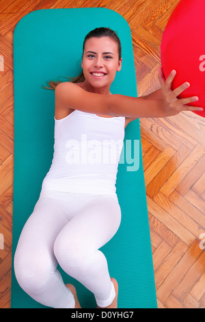 physiotherapy exercises with bobath ball fitball Stock Photo - Alamy