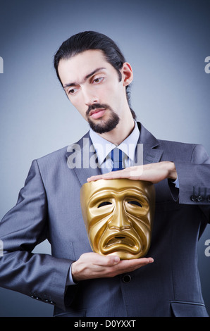 Businessman with mask concealing his identity Stock Photo - Alamy