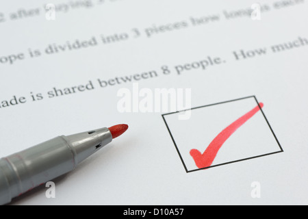 Tick mark on an exam paper, with pen. Text not subject to copyright. 36 ...