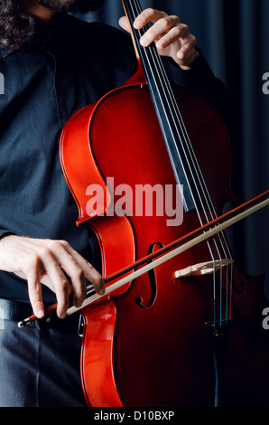 Cello player during performance Stock Photo - Alamy