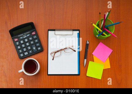 Desk top with many items Stock Photo - Alamy