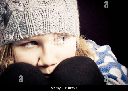 Scarf, Sad child with fur hat and winter coat, cold concept and storm ...