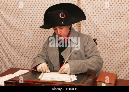 Napoleon Bonaparte sitting in his tent preparing next day's battle by ...