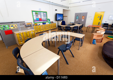 Unoccupied classroom with half circle table layout Stock Photo - Alamy