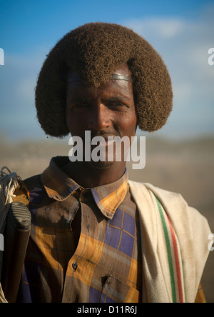 Portrait Of A Karrayyu Tribe Man In Red Clothes With Traditional ...