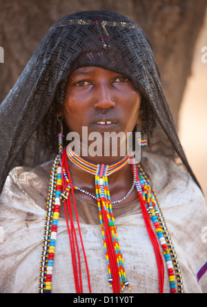 Portrait Of A Karrayyu Tribe Woman With Colourful Necklaces And Black ...
