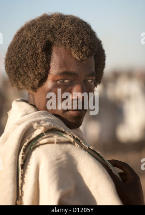Portrait Of A Karrayyu Tribe Man In Red Clothes With Traditional ...