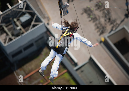 Berlin, Germany, Springer bungee jumping from the roof of the Park Inn ...