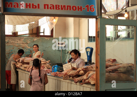 Butchers in the Naran Tuul 'Black' market, Ulaanbaatar Stock Photo - Alamy