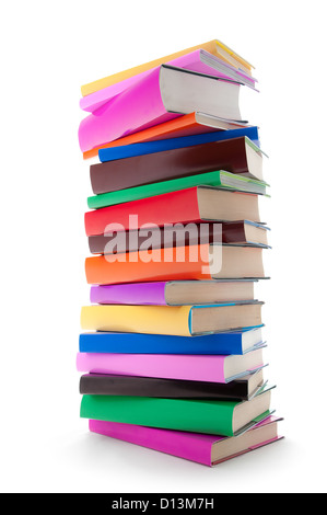 stack of colored books on white desk closeup Stock Photo - Alamy