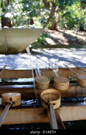 Wooden dipper of holy zen water in Japan Shinto temple Stock Photo - Alamy