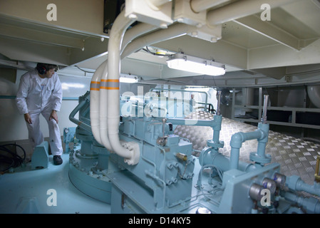 Marine engineer working in ship's workshop in engine control room Stock ...