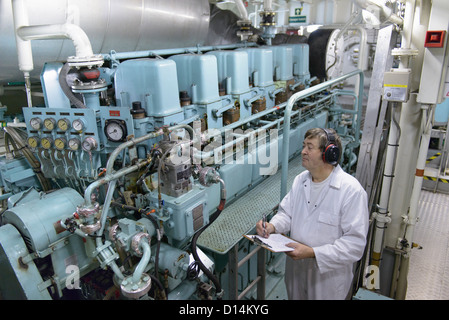 Marine engineer working in ship's workshop in engine control room Stock ...