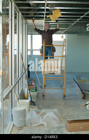 Caucasian Construction Worker Installing Scaffolding Elements Stock ...