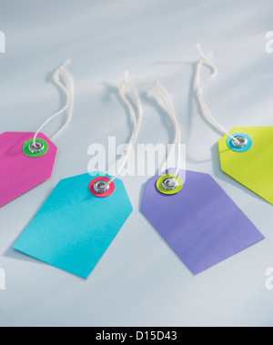 Close up of gift tags with strings Stock Photo - Alamy