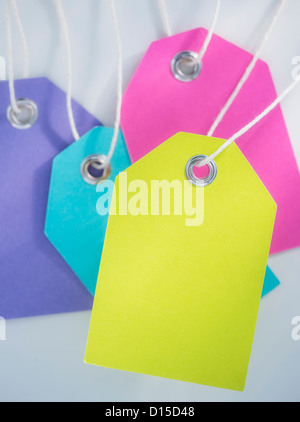 Close up of gift tags with strings Stock Photo - Alamy
