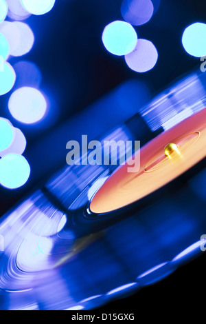 Spinning vinyl record. Motion blur image. Vintage toned. Shallow depth ...