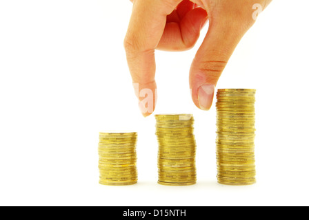 Hand put coin to money staircase , isolated on white Stock Photo - Alamy