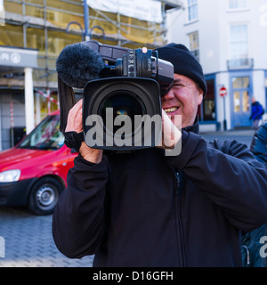 Cameraman using a Sony television broadcast camera Stock Photo - Alamy