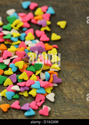 small sugar candy in the form of hearts Stock Photo - Alamy