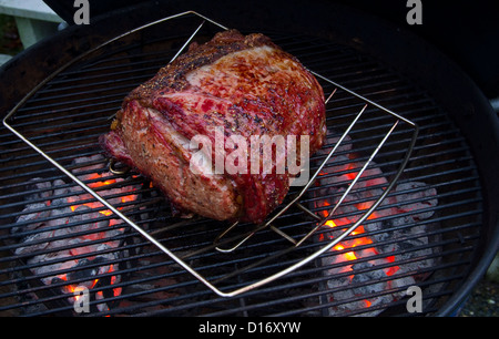 Prime Rib Roast on Charcoal Barbecue Stock Photo - Alamy