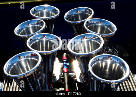 The air intake trumpets of a V8 racing engine Stock Photo - Alamy