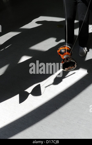 diabolo juggle juggling shadow circus Stock Photo - Alamy