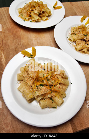 Italy, short pasta (maccheroni) with tuna fish eggs and oranges sauce ...