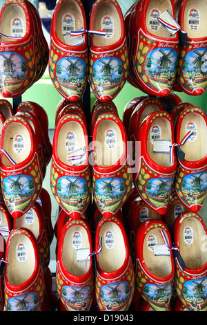 Dutch clogs or wooden shoes, decorated with a windmill and flowery ...