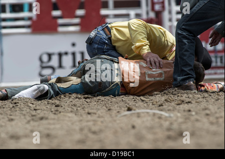 Injured rodeo cowboy Stock Photo - Alamy