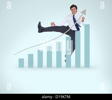 Smiling businessman jumping over the graphical presentation Stock Photo ...